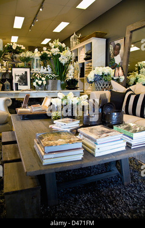 A white towel on a luxurious pink bedspread on the bed, a close-up view ...