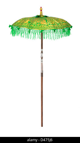 Green and yellow parasol on the beach of Straccoligno, near Capoliveri ...