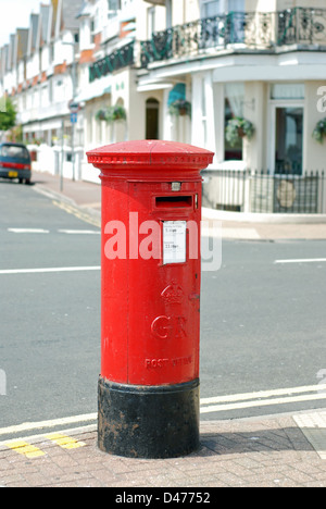 Round tall british Red mail box Stock Photo - Alamy