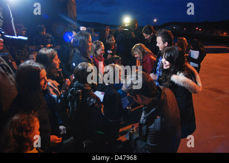 US Navy Cast members of Nickelodeon's TV show iCarly pose for a with ...