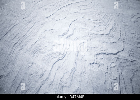 Texture of snowdrift with nice curved shadows Stock Photo - Alamy