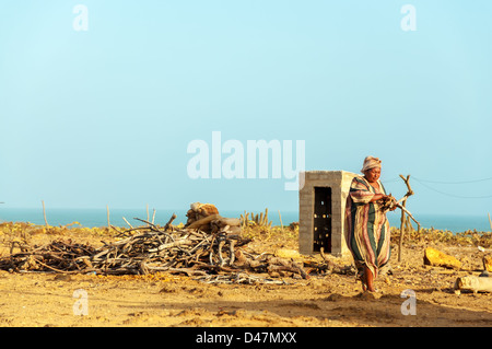 Indian Wayuu woman in traditional clothing and with face painting on ...