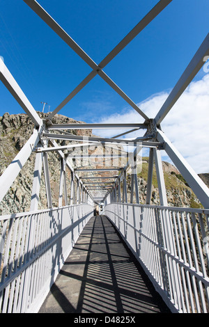 Suspension bridge to the South Stack lighthouse near Holyhead, Wales ...