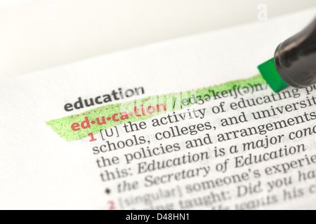 Education definition highlighted in green Stock Photo - Alamy