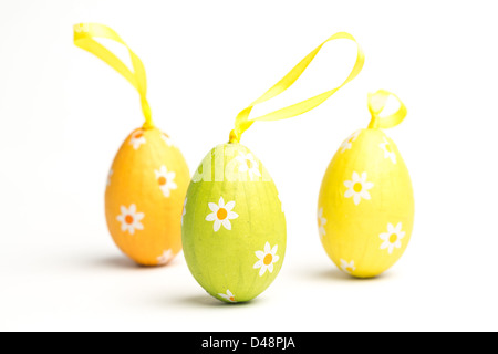 Three foil wrapped easter eggs in the grass Stock Photo - Alamy