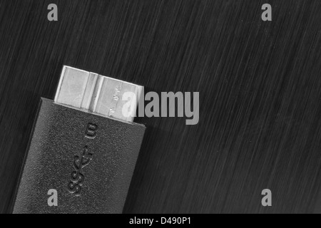 Close up of black tip of cable USB SS Stock Photo - Alamy