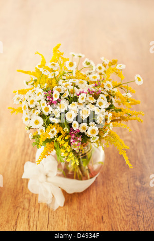Vase of carnation flower on wooden table. pink background Stock Photo ...