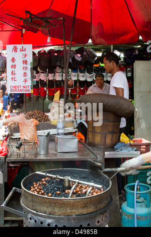 roasted chestnut stall in Malaysia Stock Photo - Alamy