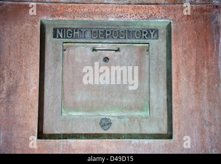 Night safe deposit box on outside wall at a Lloyds country bank Stock ...