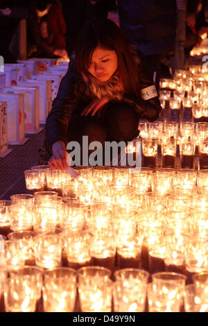 Miyagi, Japan. 10th March, 2013. People pray on 10th March, 2013 at a ...