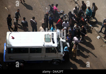 Cairo, Egypt. 10th March, 2013. Egyptians microbus drivers park their ...