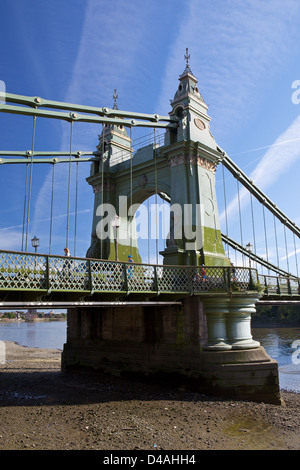 Hammersmith Bridge is a suspension bridge that crosses the River Thames ...
