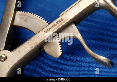 The ratchet mechanism of self-retaining Travers forceps Stock Photo ...