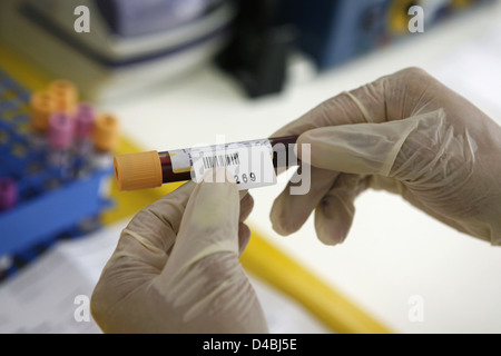 Pathologist labeling blood samples in test tube Stock Photo - Alamy