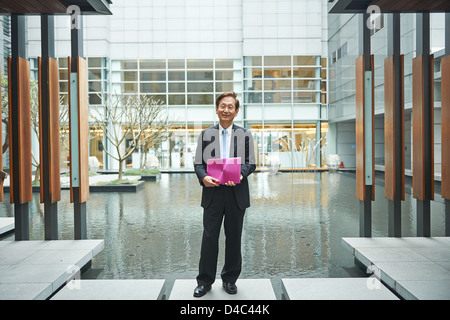 Jonney Shih, Chairman of ASUS, holding an ASUS ZENBOOK inside the Zen ...
