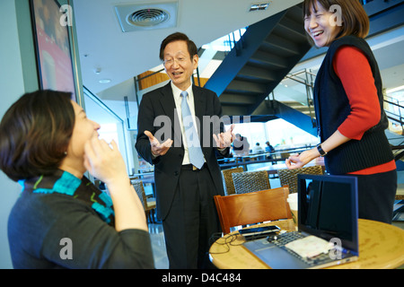 Jonney Shih, Chairman of ASUS, interacts with coworkers at Starbucks on ...
