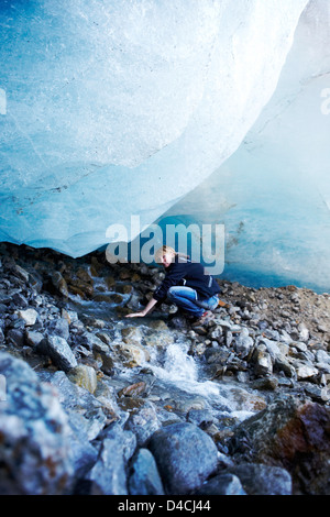 Frozen woman with block of ice Stock Photo - Alamy