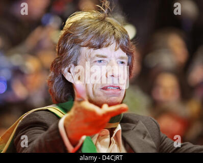 Mick Jagger of the Rolling Stones gestures to the crowd while singing ...