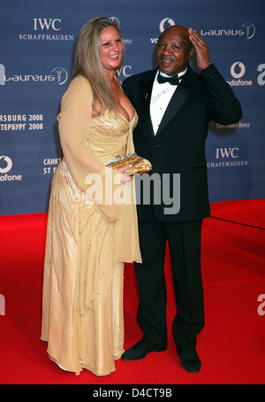 US former boxing champion Marvin Hagler (R) and his wife Kay Guarino (L ...