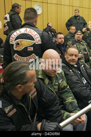Members of the Motorcycle Club 'Bandidos' stand in front of the ...