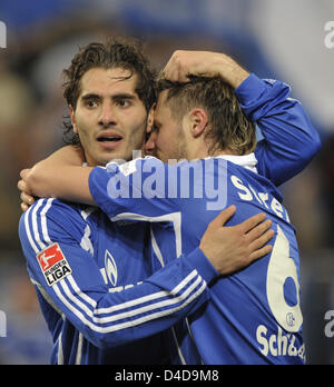 Schalke's Halil Altintop (L) cheers with teammate Ivan Rakitic after ...