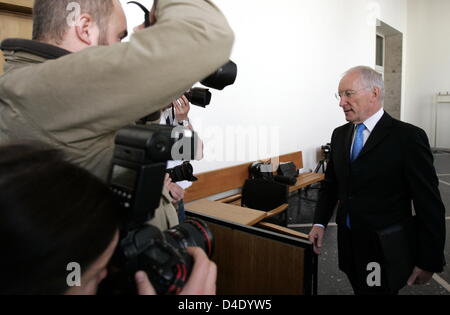 Investment banker Robin Saunders arrives at court in Duesseldorf ...