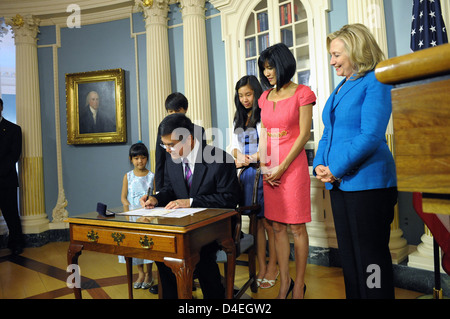 U.S. Ambassador to China Gary Locke, left, and his wife Mona Lee Locke ...