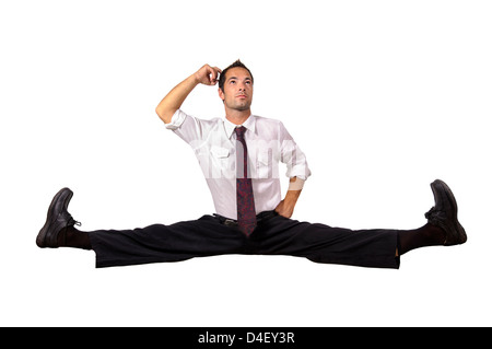 Businessman doing splits isolated in white Stock Photo - Alamy