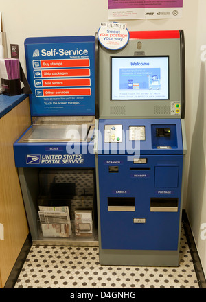 Automated Postal Center self service kiosks at a post office. a ...