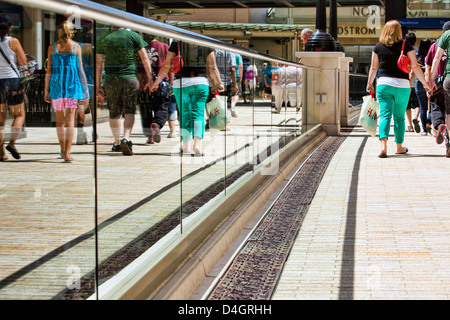 Shopping Mall sidewalk reflection people Stock Photo - Alamy