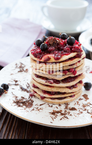 biscuits with blueberry jam on a white background Stock Photo - Alamy