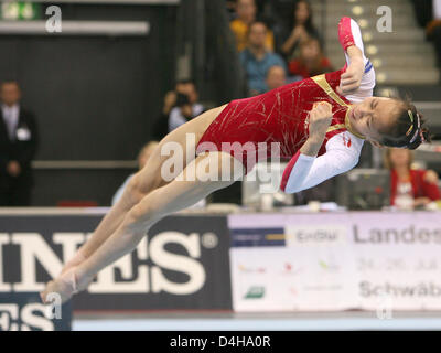 Chinese gymnast Cheng Fei performs on the vault during a podium ...