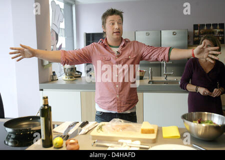 Jamie Oliver poses in a kitchen in London, ahead of the publication of ...