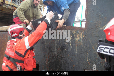 CGC Seneca tows fishing vessel Stock Photo - Alamy