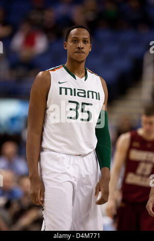 Miami forward Kenny Kadji (35) battles for the ball with Pacific ...