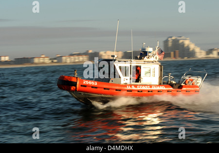 25' Defender Class US Coast Guard RB-S Patrol boat jumps over a wave on ...