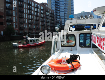 Chicago Police Department Marine Unit Officer Mark Walsh, left ...