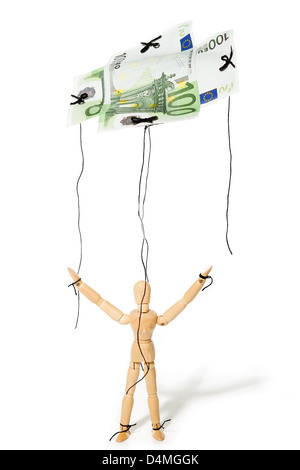 concept, a puppet controlled by money Stock Photo - Alamy