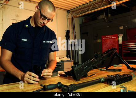 GM Gunners Mate Seth Johnson conducted routine weapon maintenance on ...