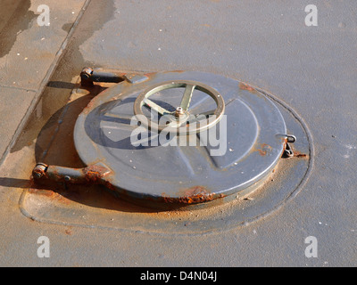Metal hatch in the soil of a ship Stock Photo - Alamy