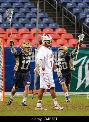 March 16, 2013: Notre Dame players celebrate their overtime victory ...