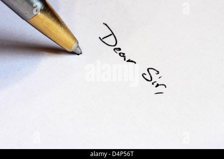 Writing Dear Sir with a ball point pen Stock Photo - Alamy