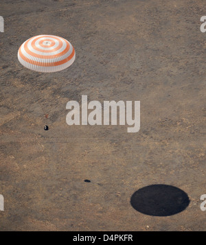 The Soyuz TMA-18 capsule from Expedition 24 successfully lands in ...