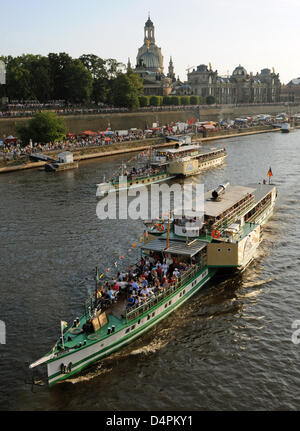 Historic steamers are pictured during their traditional parade on the ...