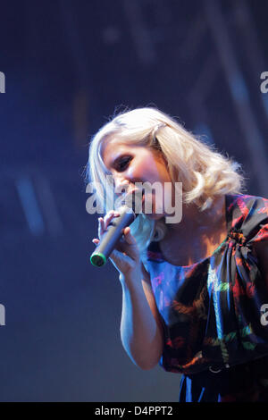 Heidi Range of pop band the Sugababes hands out chocolate during the ...