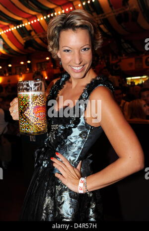 TV host Kim Heinzelmann poses during ProSiebenSat.1 TV Deutschland's ...
