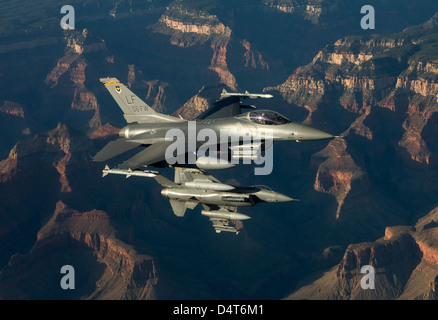 Two F-16's from Luke Air Force Base, Arizona, fly in formation over ...