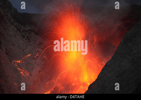 Strombolian type eruption of Batu Tara volcano, Indonesia Stock Photo ...