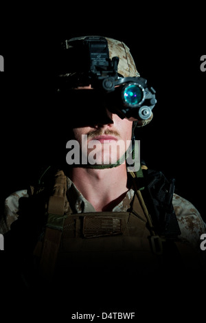 Night vision goggles on military helmet, closeup detail to blue ...