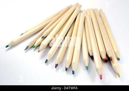 Color pencils scattered on green grass Stock Photo - Alamy